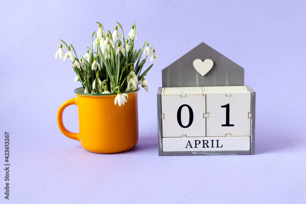 Calendar for April 1: cubes with the numbers 0 and 1, the name of the ...
