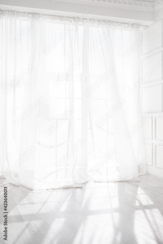 Backlit window with white curtains in empty room Stock Photo | Adobe Stock