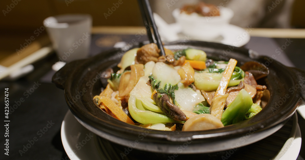 Catonese style vegan cuisine in bow, braised vegetables with red ...