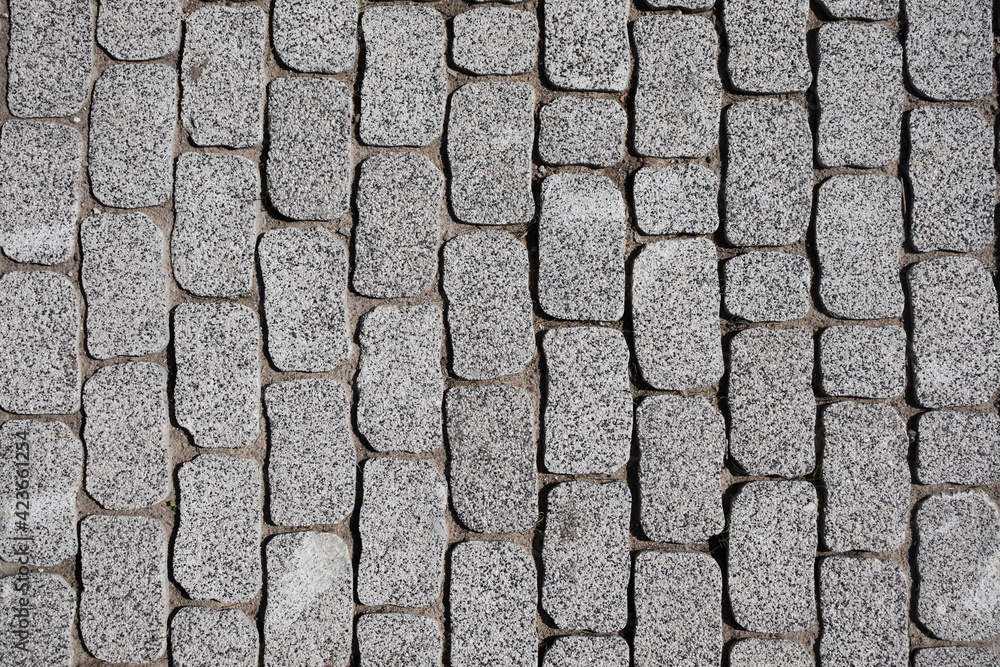 Granite pavement texture. Beautiful masonry with uneven granite blocks ...