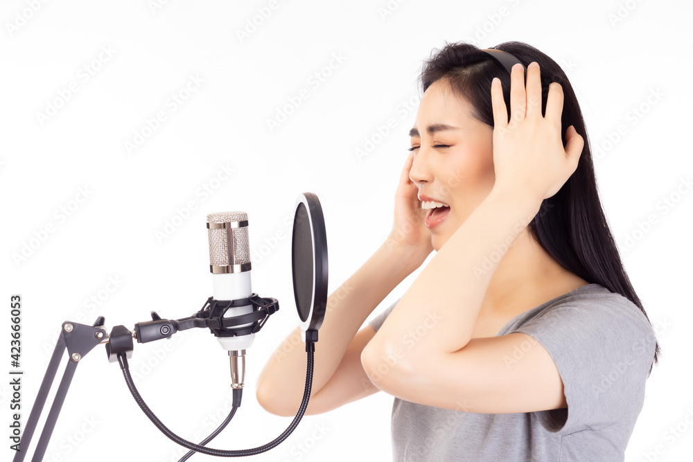 Singer female performing and singing in music studio. Singer asian ...