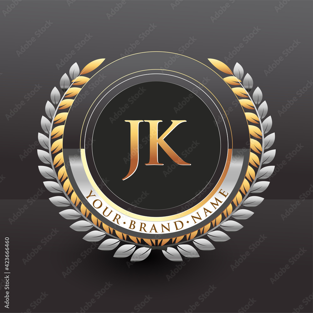 Initial logo letter JK with golden and silver color with laurel and ...