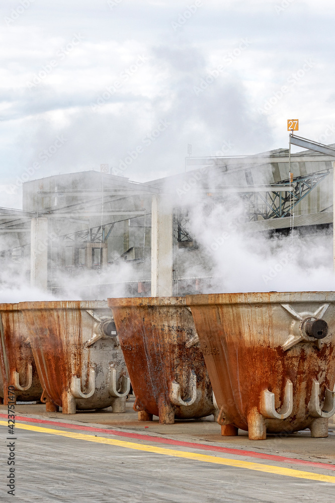 Hot slags in the melting pots in the copper processing factory. Copper ...