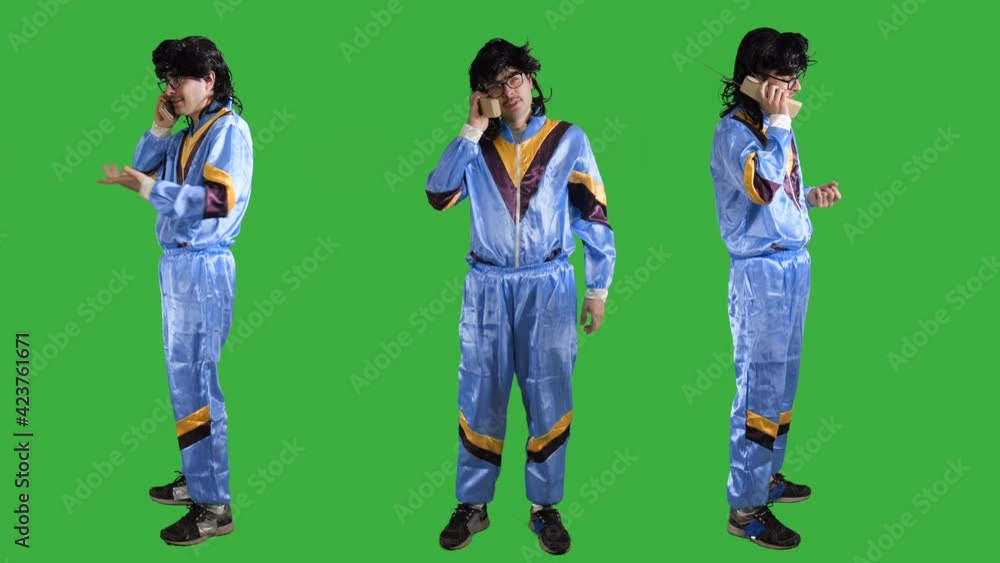 Vidéo Stock 80s 90s looking vintage man making a call on an old brick ...