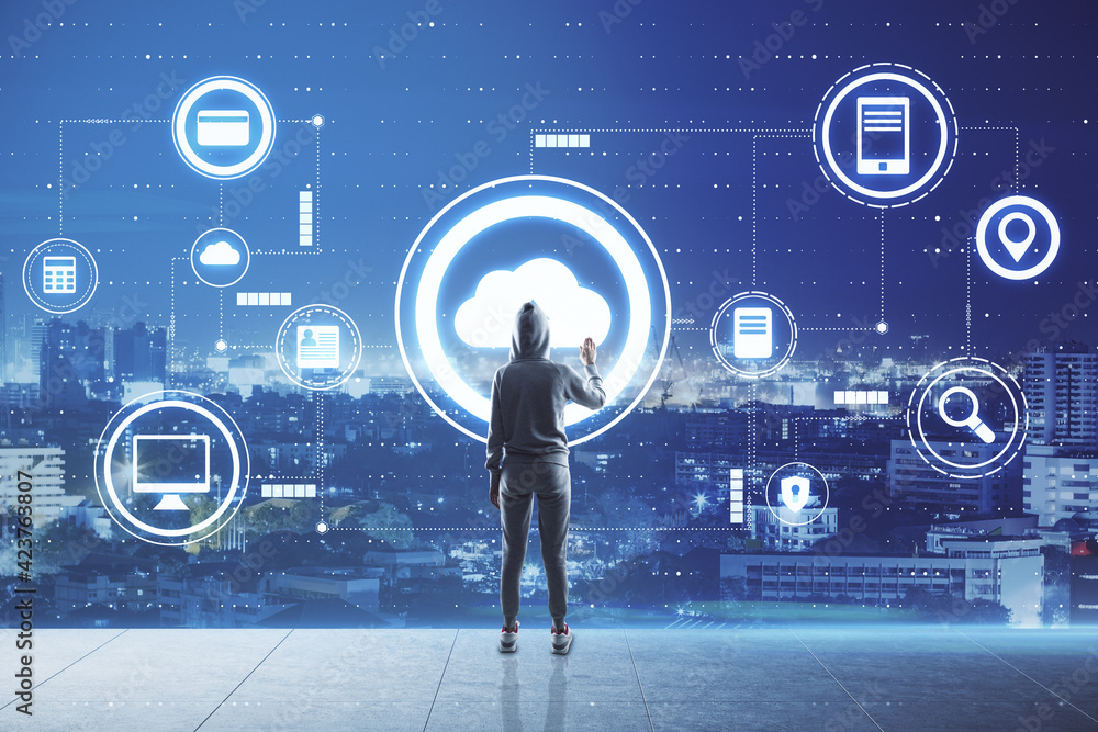 Cloud computing concept with back view on person in sport suit touches ...