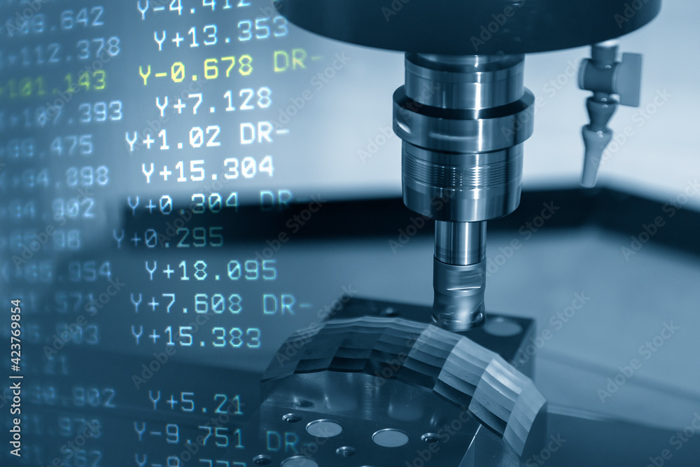 Abstract scene of CNC milling machine and G-code data background. The ...