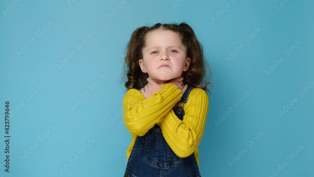Unhealthy little girl child touch neck feels discomfort painful ...