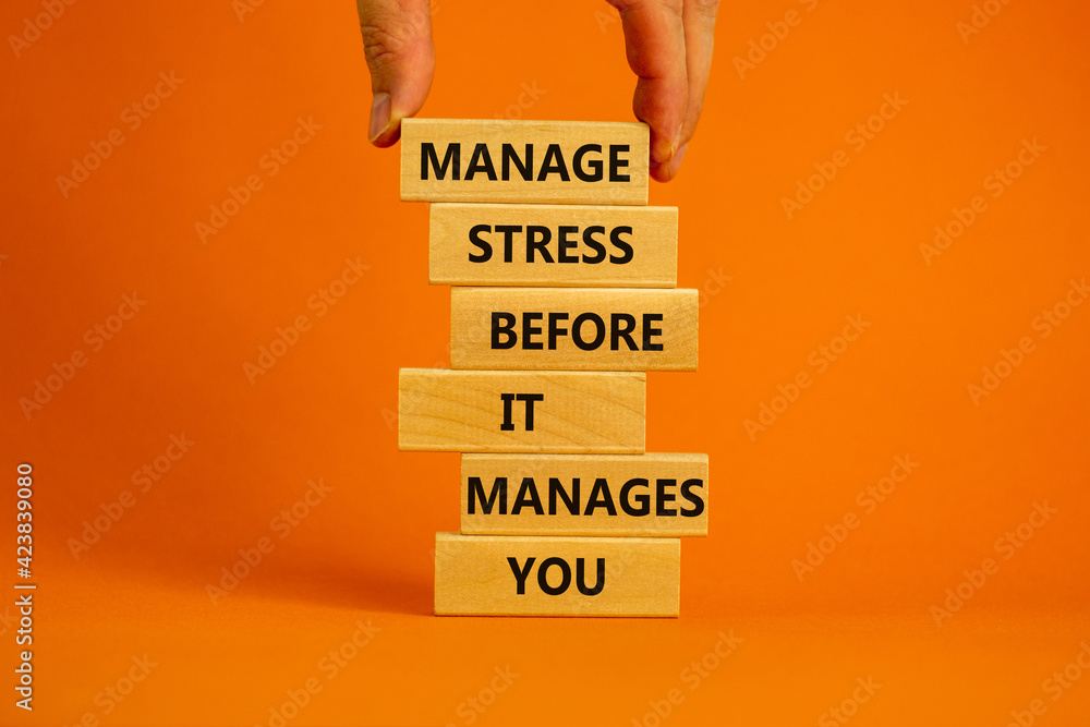 Stress management symbol. Wooden blocks with words manage stress before ...