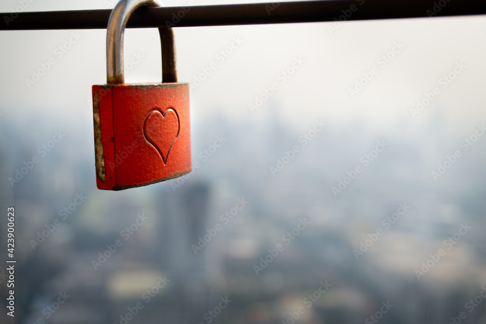 Padlock on the background of the cityscape. View from Baiyoke Sky Tower ...