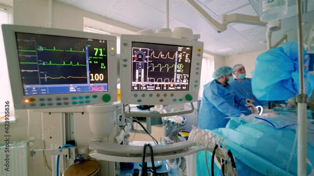 Hospital monitor in the operating room. Screen shows vital signs of a ...