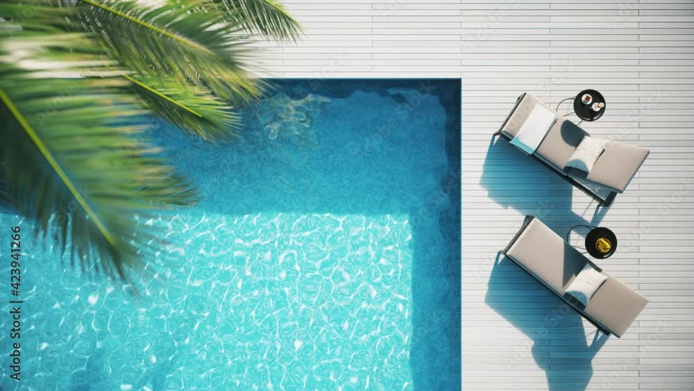 Lounge chair on terrace near swimming pool. Top view of pool and lounge ...