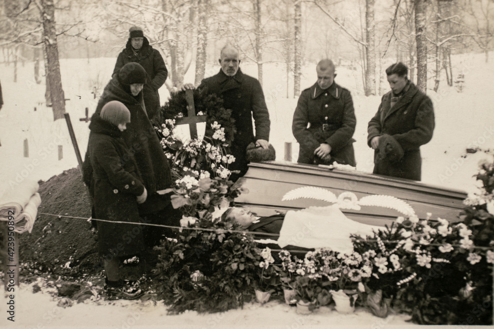 Latvia - CIRCA 1930s: People at funeral ceremony. Group photo in ...