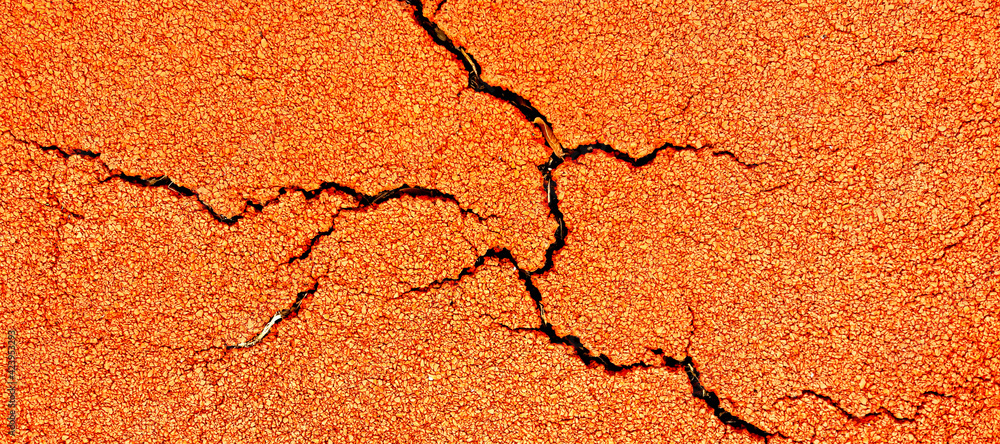 Rubber floor texture background. EPDM playground surface. Red cracked ...