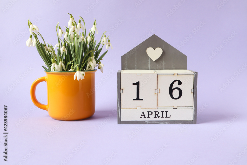 Calendar for April 16: cubes with the number 16, the name of the month ...