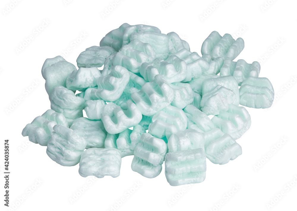 Green polystyrene foam chips isolated on a white background with ...