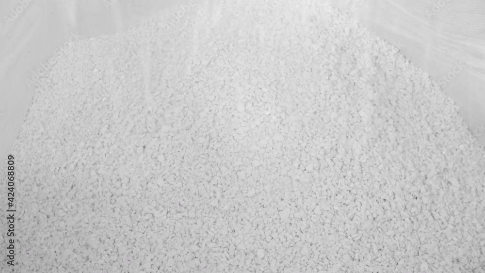 White hard grinded plastic comes out of the cyclone of the machine by ...