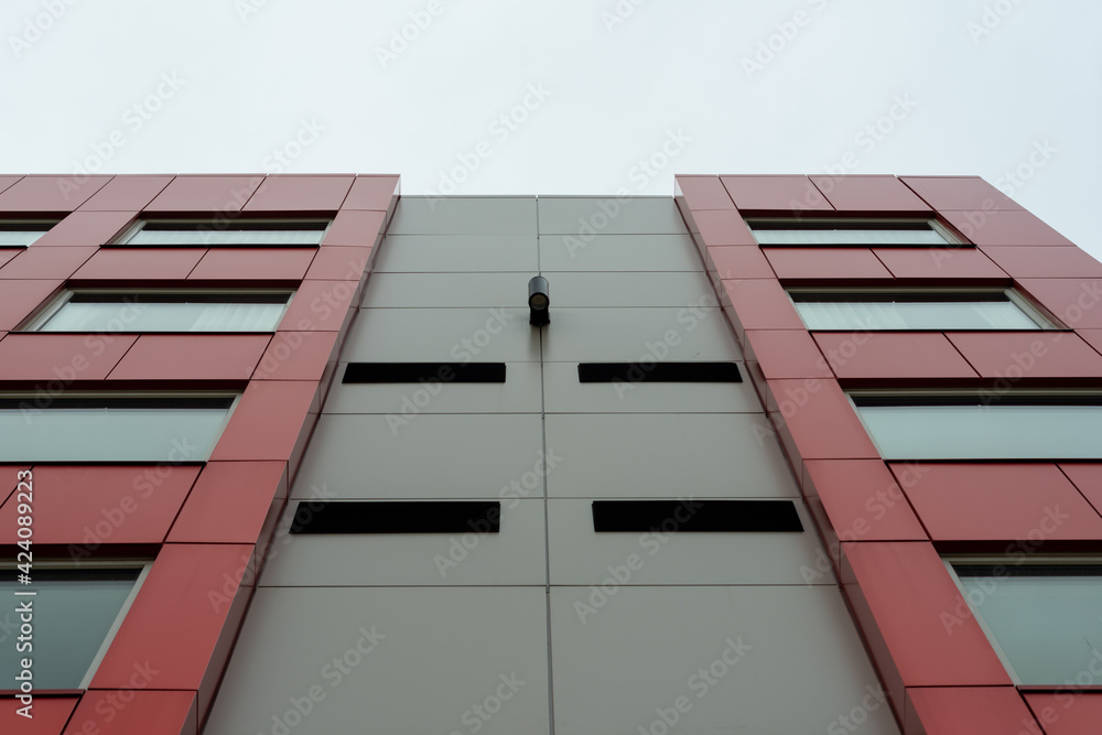 The exterior wall of a contemporary commercial style building with ...