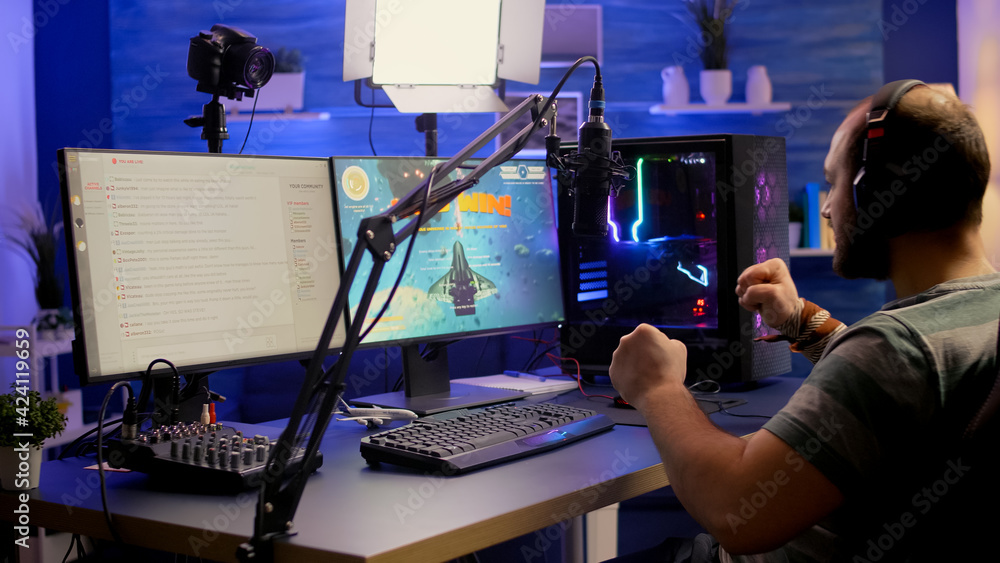 Streamer man winning space shooter online competition using ...