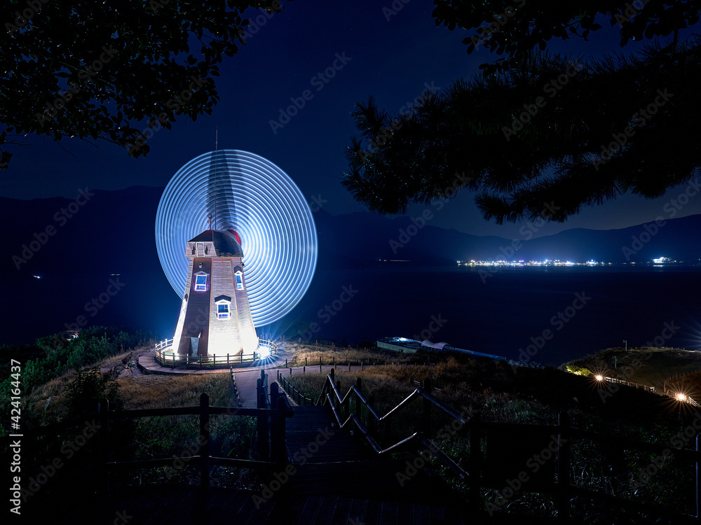 windmil at night Stock Photo | Adobe Stock