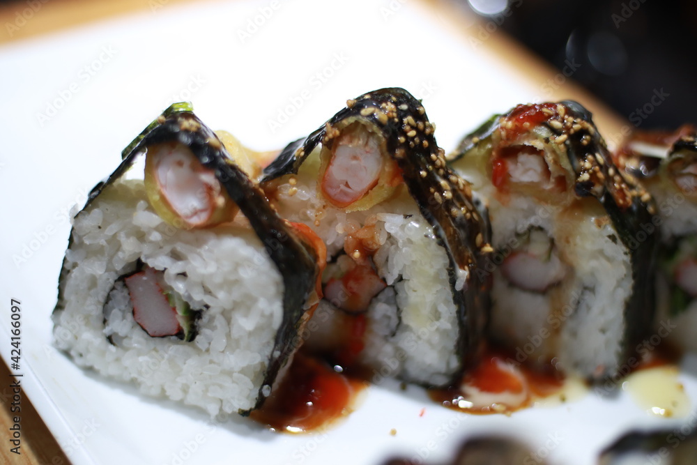Sushi rolled sliced fish eggs also known as tobiko, masago, ikura Stock ...