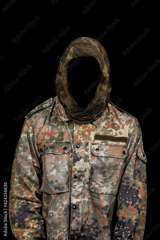 Portrait of a soldier without face in a military uniform on a black ...