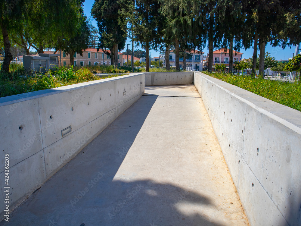 Concrete ramp for an underground pedestrian crossing. Stock Photo ...