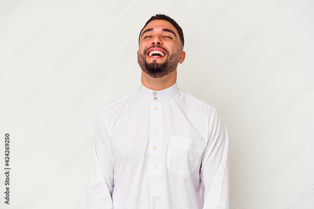 Young arab man wearing typical arab clothes isolated on white ...