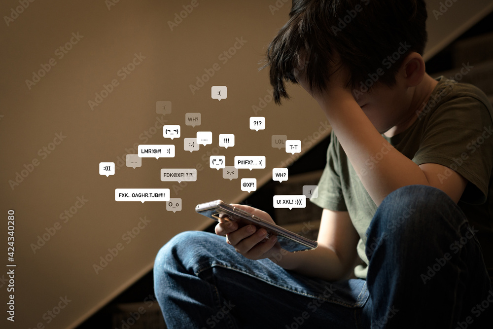 Cyberbullying - social media harassment concept. Young asian preteen ...