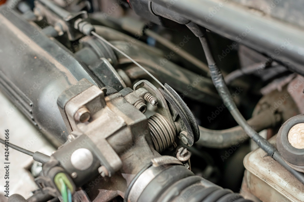 Throttle control cable, throttle cable under the hood of the car. Stock ...