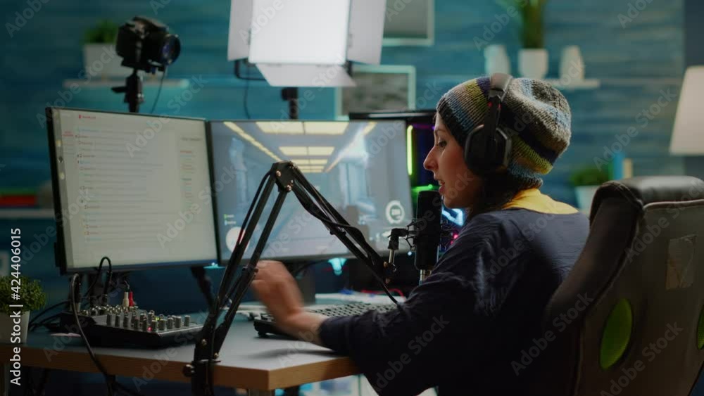 Pro streamer checking sound on mixer putting on headset and start ...