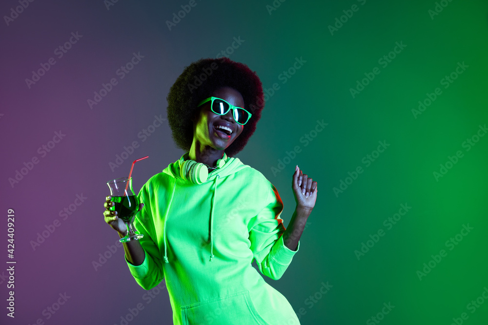 Portrait of cheerful dark skin girl hand hold drink enjoy glass ...