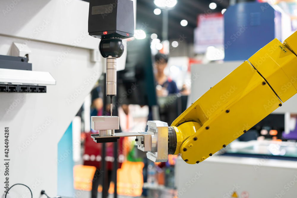 automatic coordinate measurement machine (CMM) during inspection ...