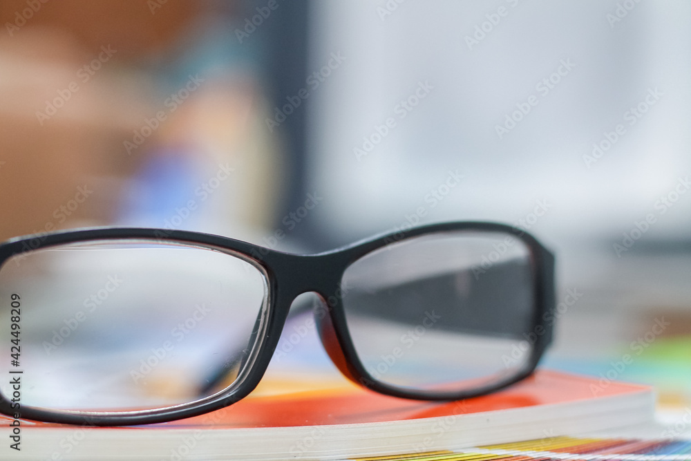 The glasses placed on the desk are pre-made glasses for working in ...