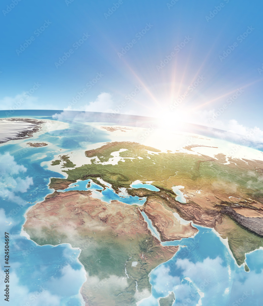 Sun shining through clouds, in blue sky, over a high detailed satellite ...