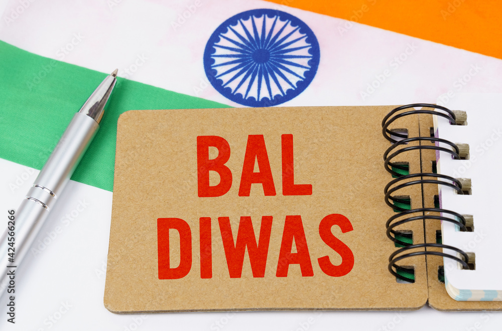 Against the background of the flag of India lies cardboard with the ...