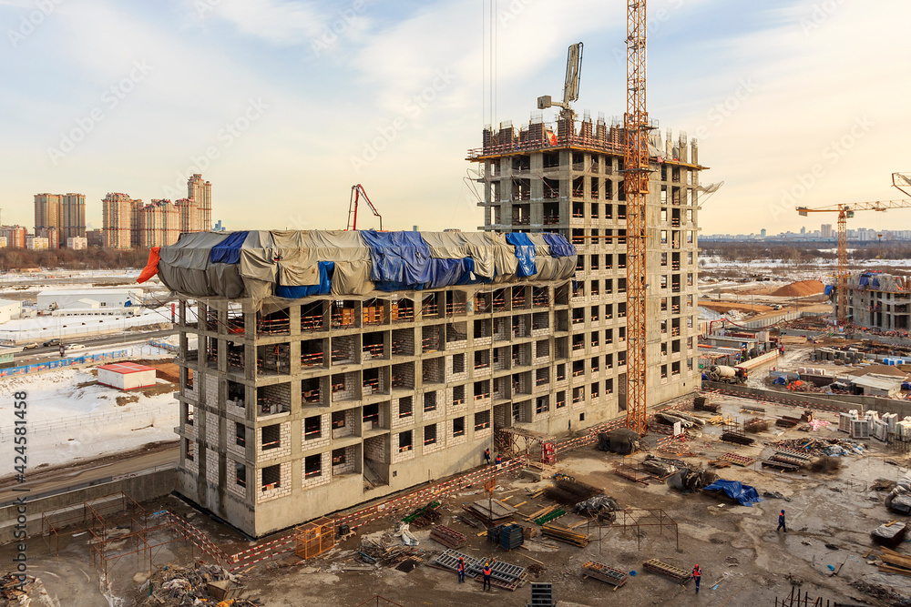 Construction site. Hoisting cranes. new multi-storey buildings ...
