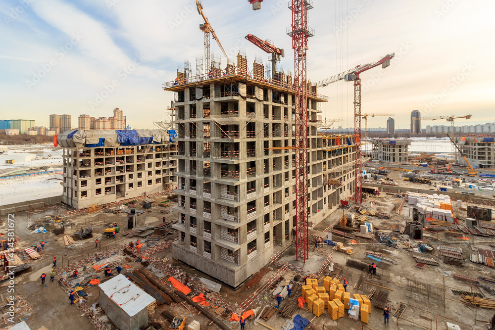 Construction site. Hoisting cranes. new multi-storey buildings ...