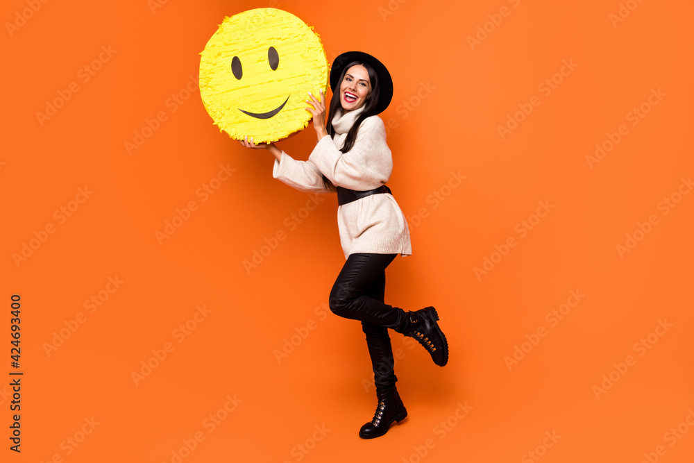 Full size photo of young beautiful smiling excited girl hold huge paper ...