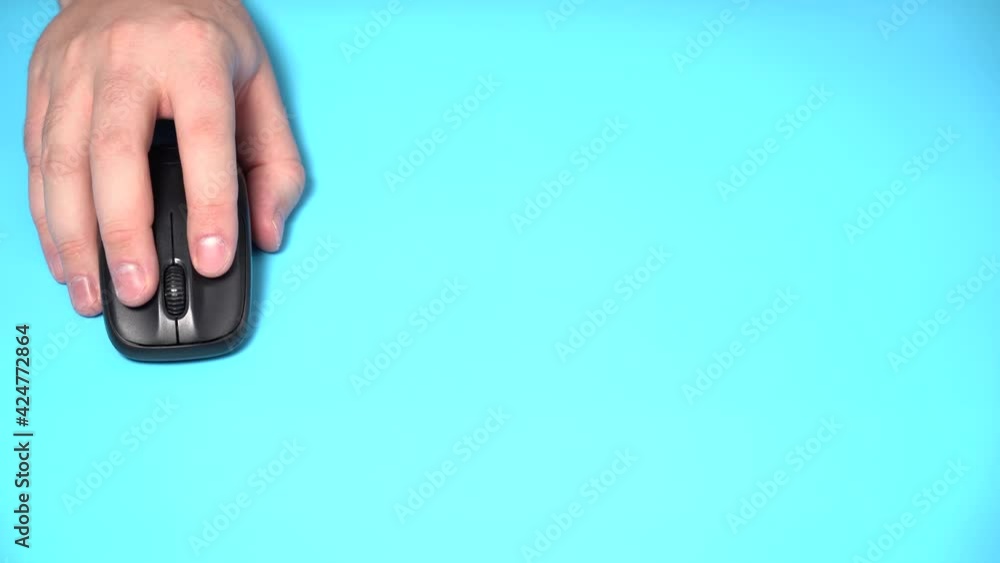 Hand with Wireless Computer Mouse Moves and Clicks. Top View Shot ...