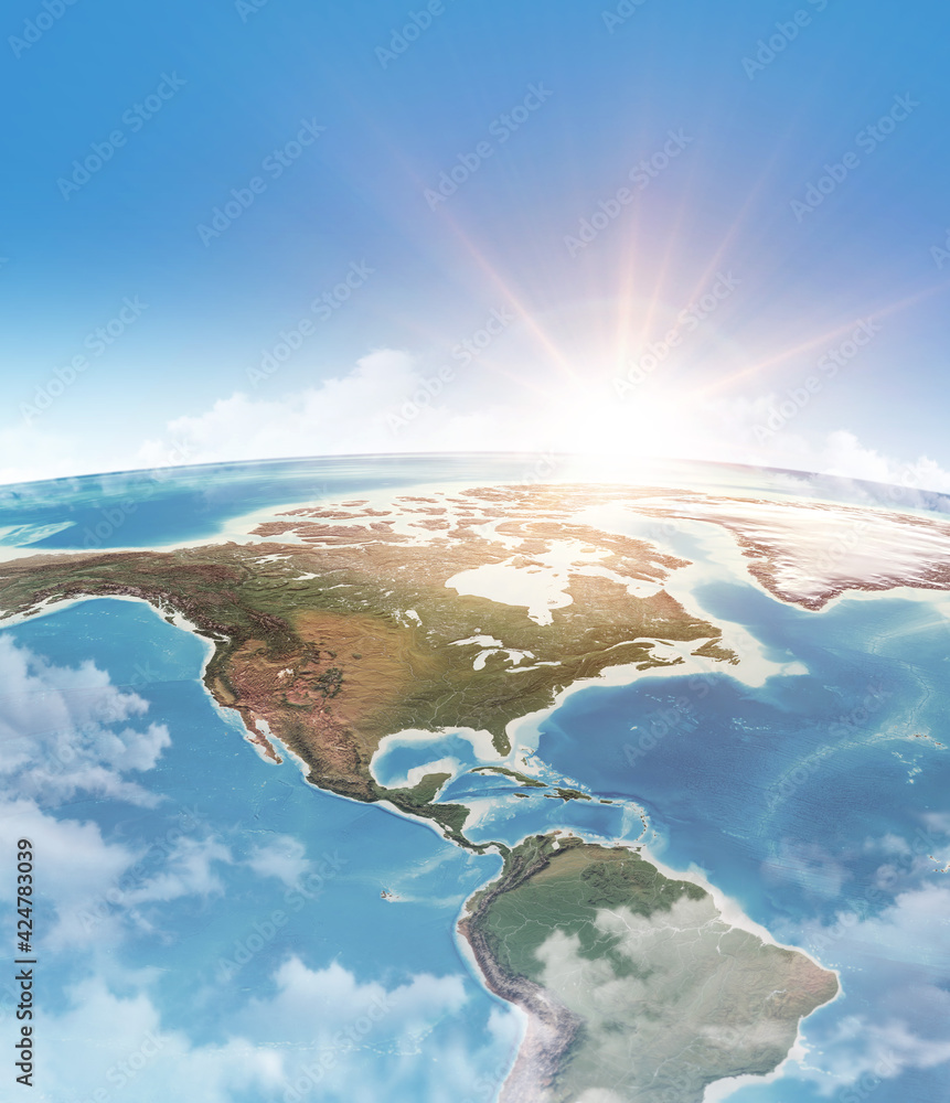 Sun shining through clouds, in blue sky, over a high detailed satellite ...