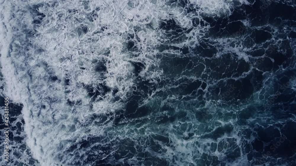 4K Nature video. Powerful stormy sea waves in top-down drone shot ...