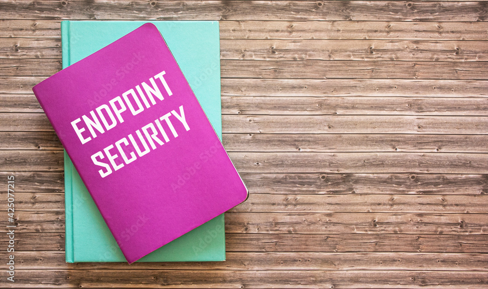 Handwritten text Endpoint Security on notepad. Concept means corporate ...