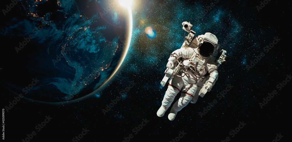 Astronaut spaceman do spacewalk while working for space station in ...