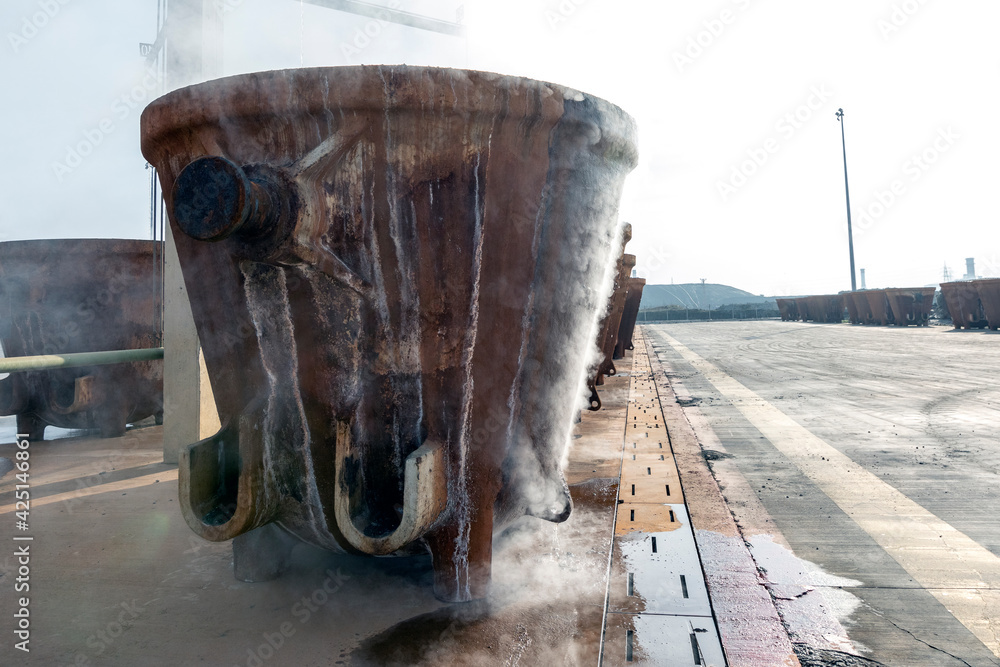 Hot slags in the melting pots in the copper processing factory. Copper ...