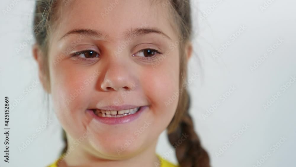 kid girl face portrait. happy family a close-up home kid dream concept ...