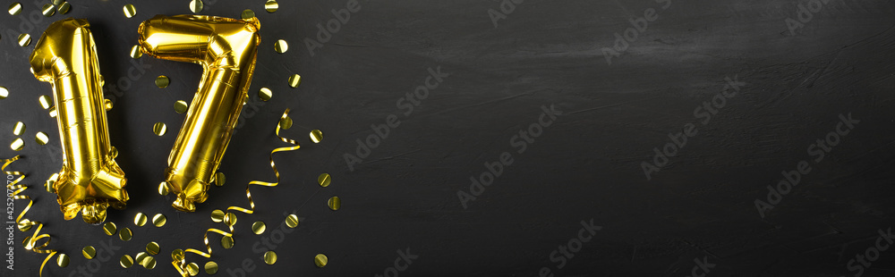 gold foil balloon number seventeen. Birthday or anniversary greeting ...