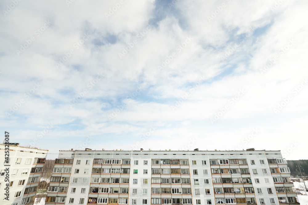 Soviet era block panel houses. Cloudy blue sky, dramatic cloudscape ...