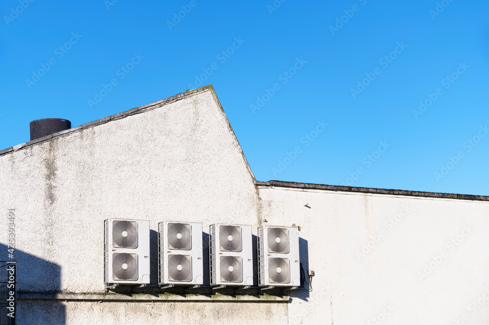 Condenser units for air conditioning system wall mounted outdoors Stock ...