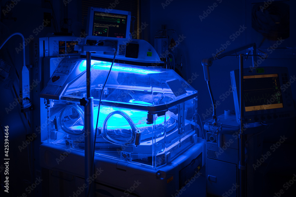 Incubator with blue light, phototherapy UV treatment for newborn baby ...