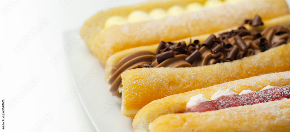 Mixed finger donuts filling chocolate, custard, jam and whipped cream ...